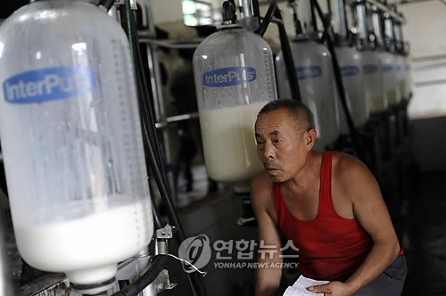 CHINA AGRICULTURE MELAMINE MILK SCANDAL