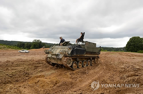 USA FEATURE PACKAGE TANK DRIVING SCHOOL