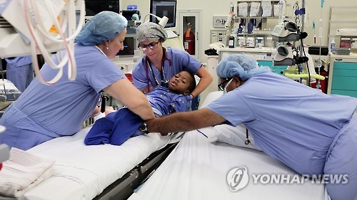 USA BILATERAL HAND TRANSPLANT CHILD