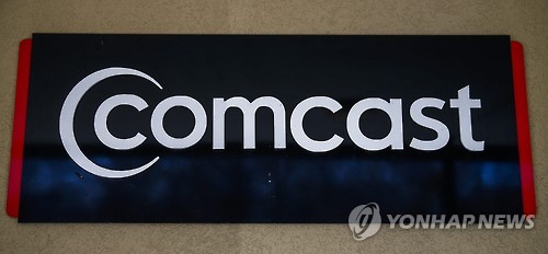 FILE USA ECONOMY COMCAST RESULTS