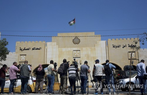 Bassem Awadallah state security trial