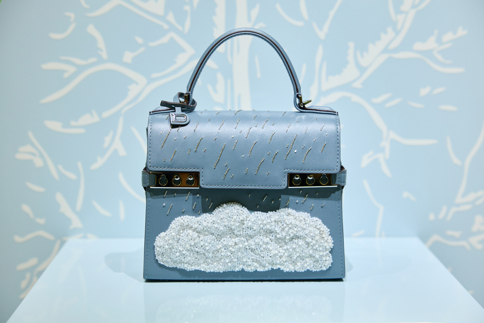 Surrealist art meets luxury leather as Delvaux CEO unveils new ...